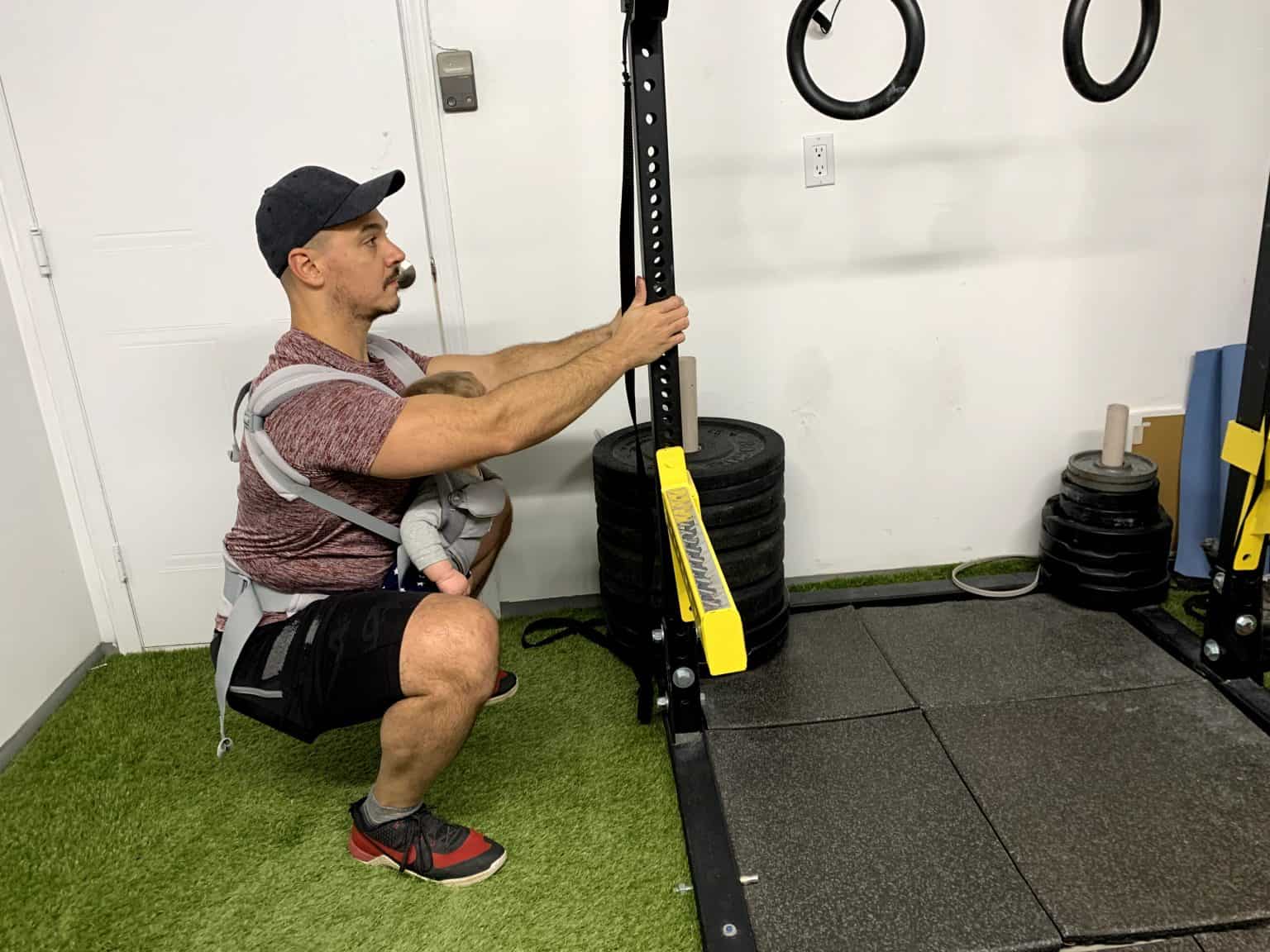 How to squat while babywearing | Upside Dad